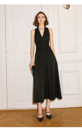 Luxurious blend of silk a hanging neckline, and sleeveless V-neck dres ...