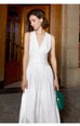 Luxurious blend of silk a hanging neckline, and sleeveless V-neck dres ...