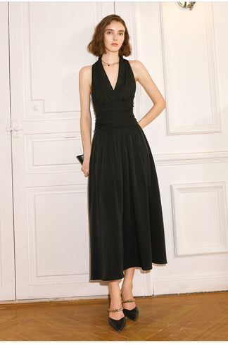 Luxurious blend of silk a hanging neckline, and sleeveless V-neck dres ...