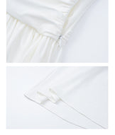 Luxurious blend of silk a hanging neckline, and sleeveless V-neck dres ...
